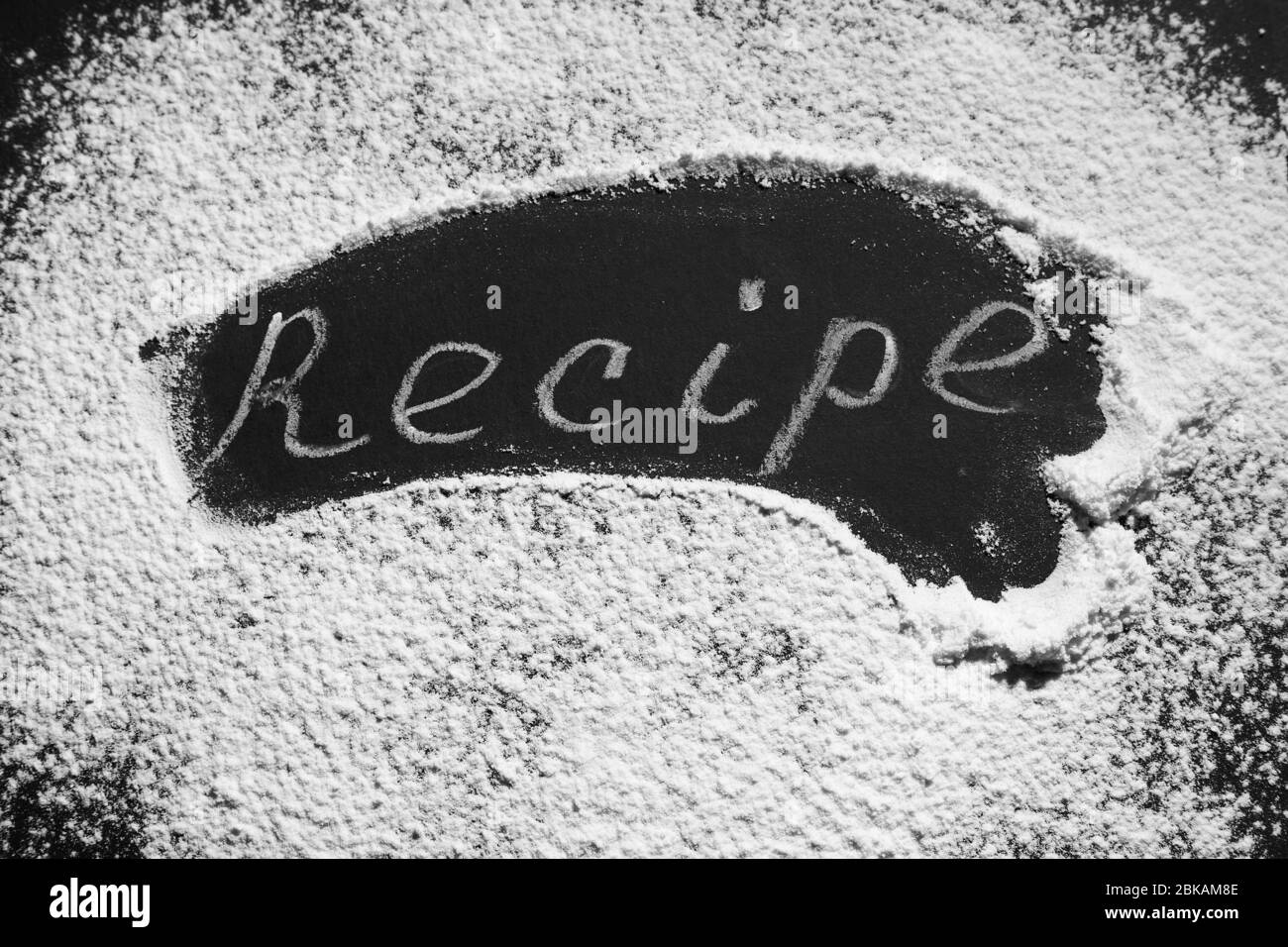 Headline recipe sprinkle flour on a black table. Banner recipe ...