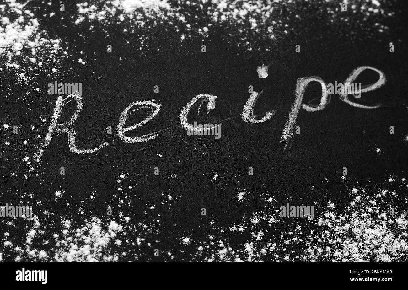 Headline recipe sprinkle flour on a black table. Banner recipe ...