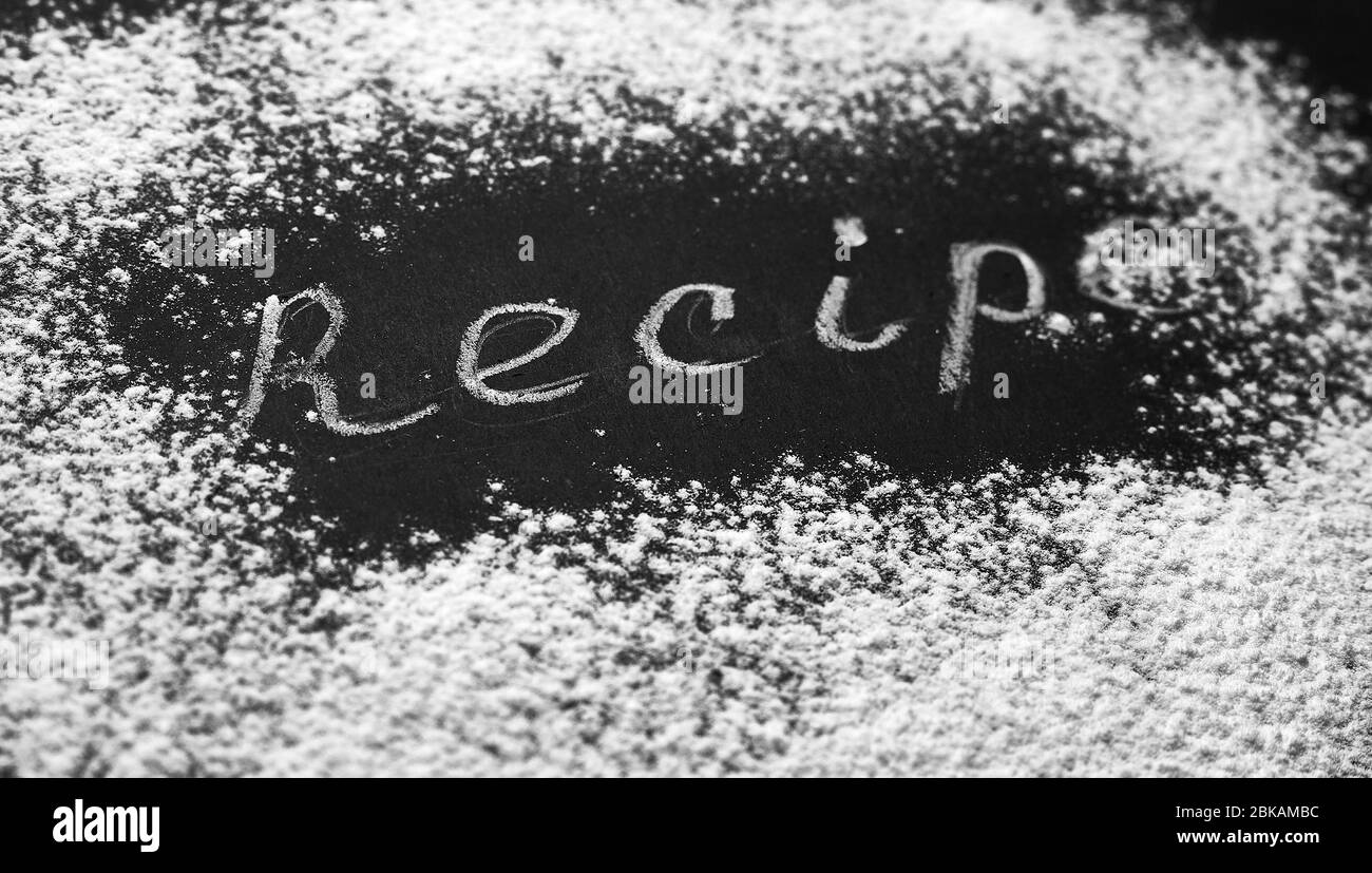 Headline recipe sprinkle flour on a black table. Banner recipe ...