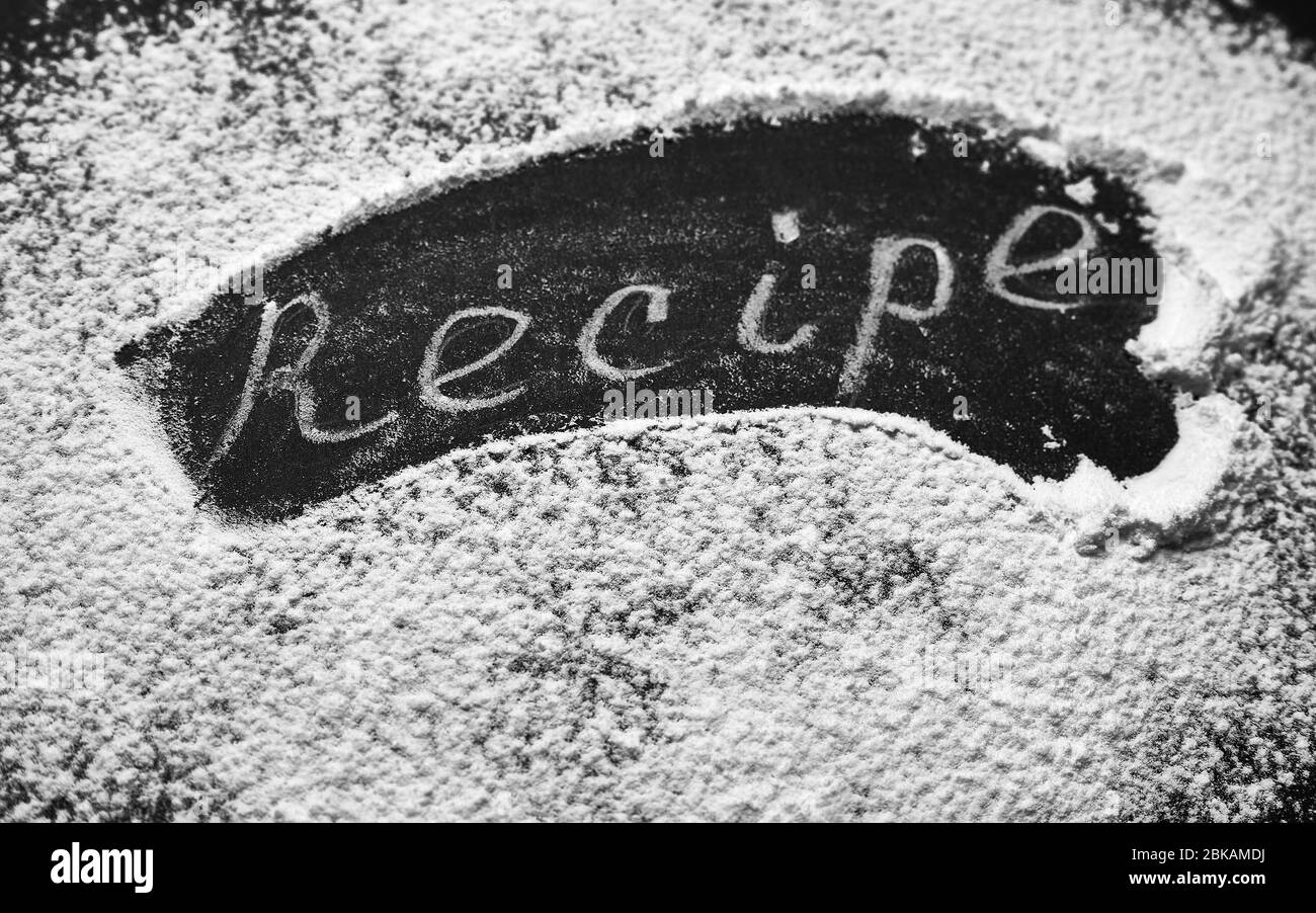 Headline recipe sprinkle flour on a black table. Banner recipe ...