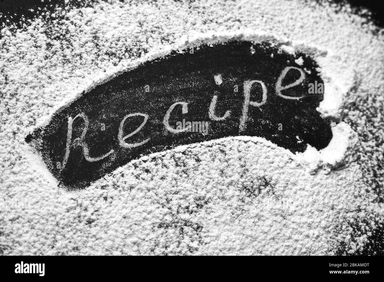 Headline recipe sprinkle flour on a black table. Banner recipe ...