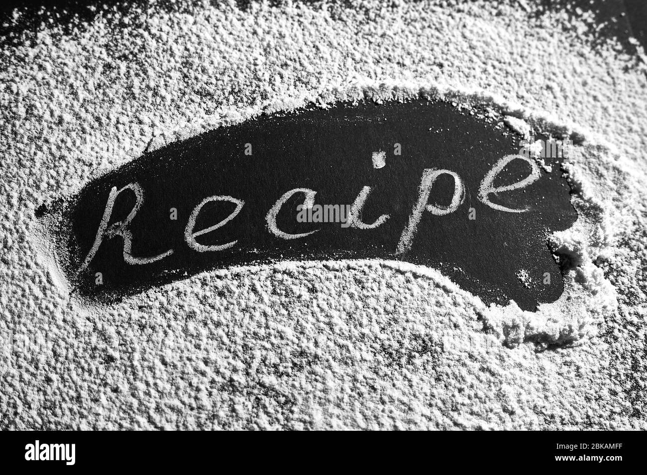 Headline recipe sprinkle flour on a black table. Banner recipe ...