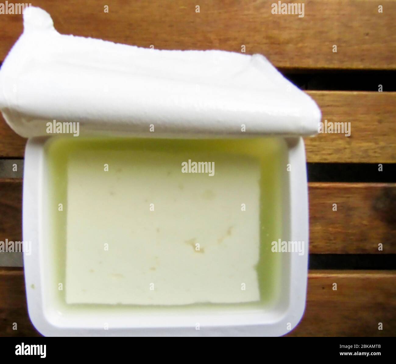 Greek Cuisine. Carton of Fresh Goats Cheese Stock Photo - Alamy