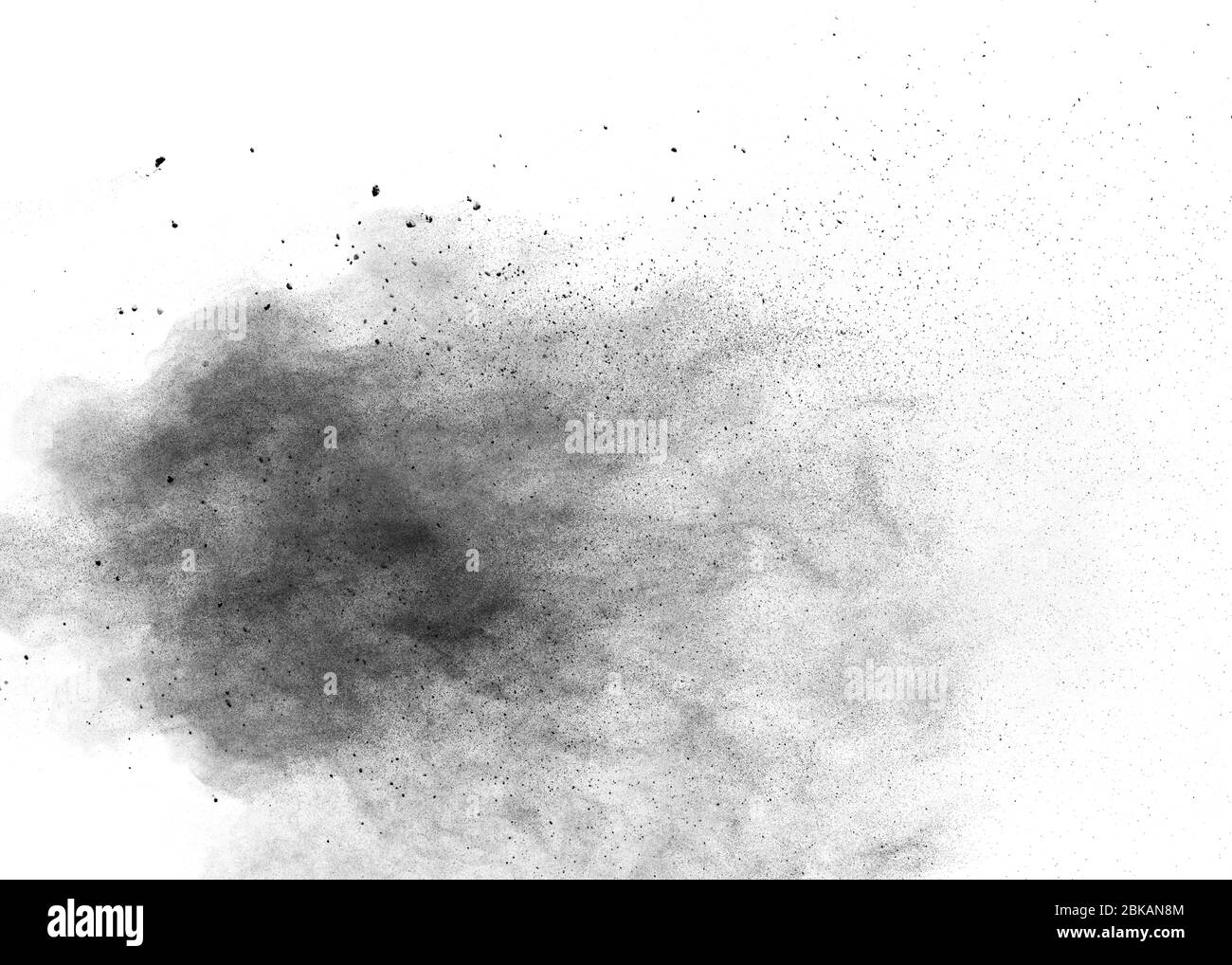 Black powder explosion on white background.Black dust particles splash ...
