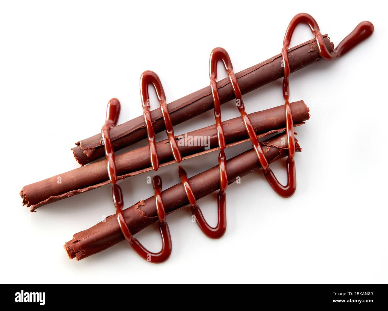 chocolate sticks and chocolate sauce isolated on white background, top ...