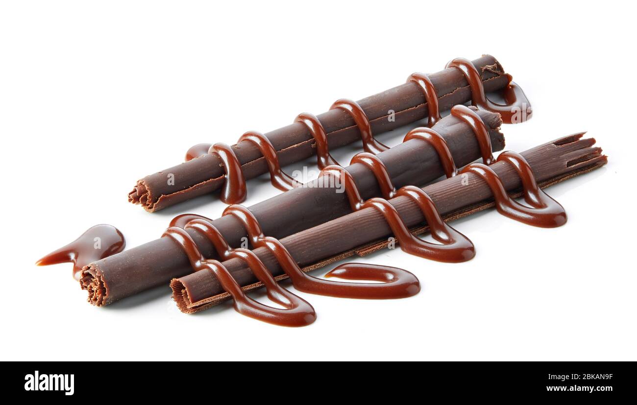 chocolate sticks with chocolate sauce isolated on white background ...
