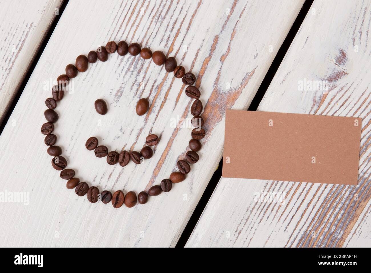 Coffee smiley face and blank paper for your text Stock Photo - Alamy