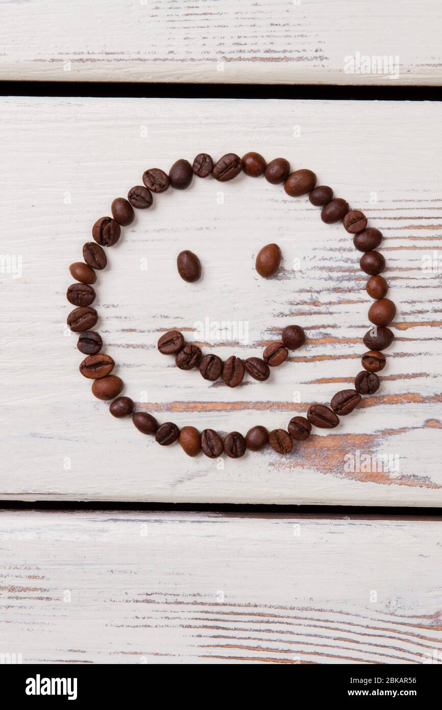Simple happy smiling face made of coffee beans Stock Photo - Alamy