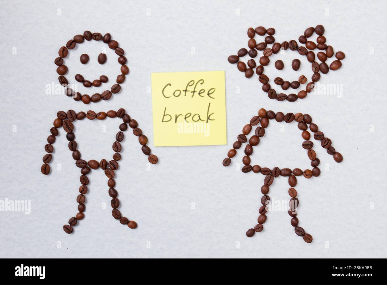 Symbolic boy and girl and coffee break concept Stock Photo - Alamy