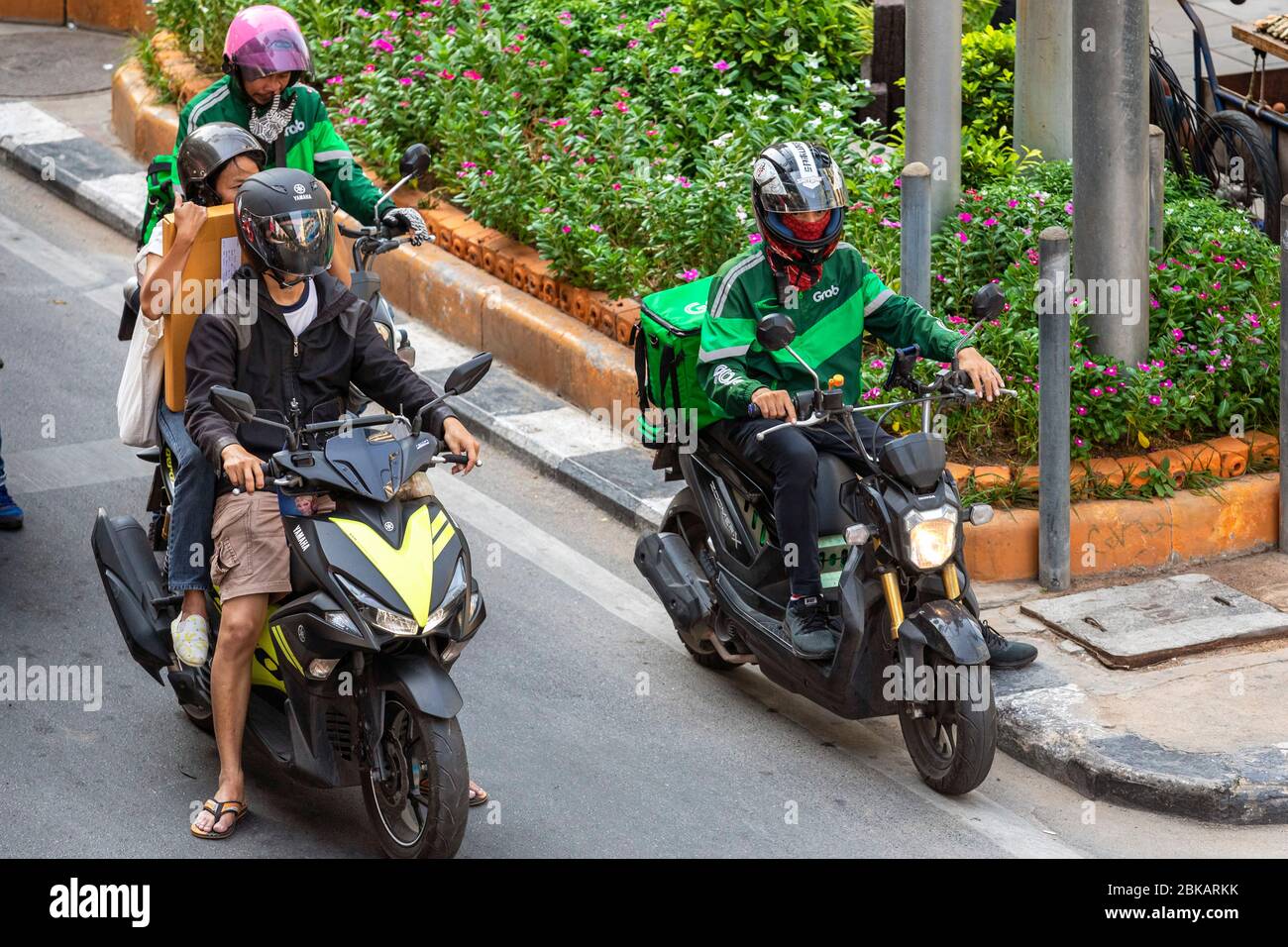 Grab motorcycle rider with face mask during Covid 19 pandemic, Bangkok ...