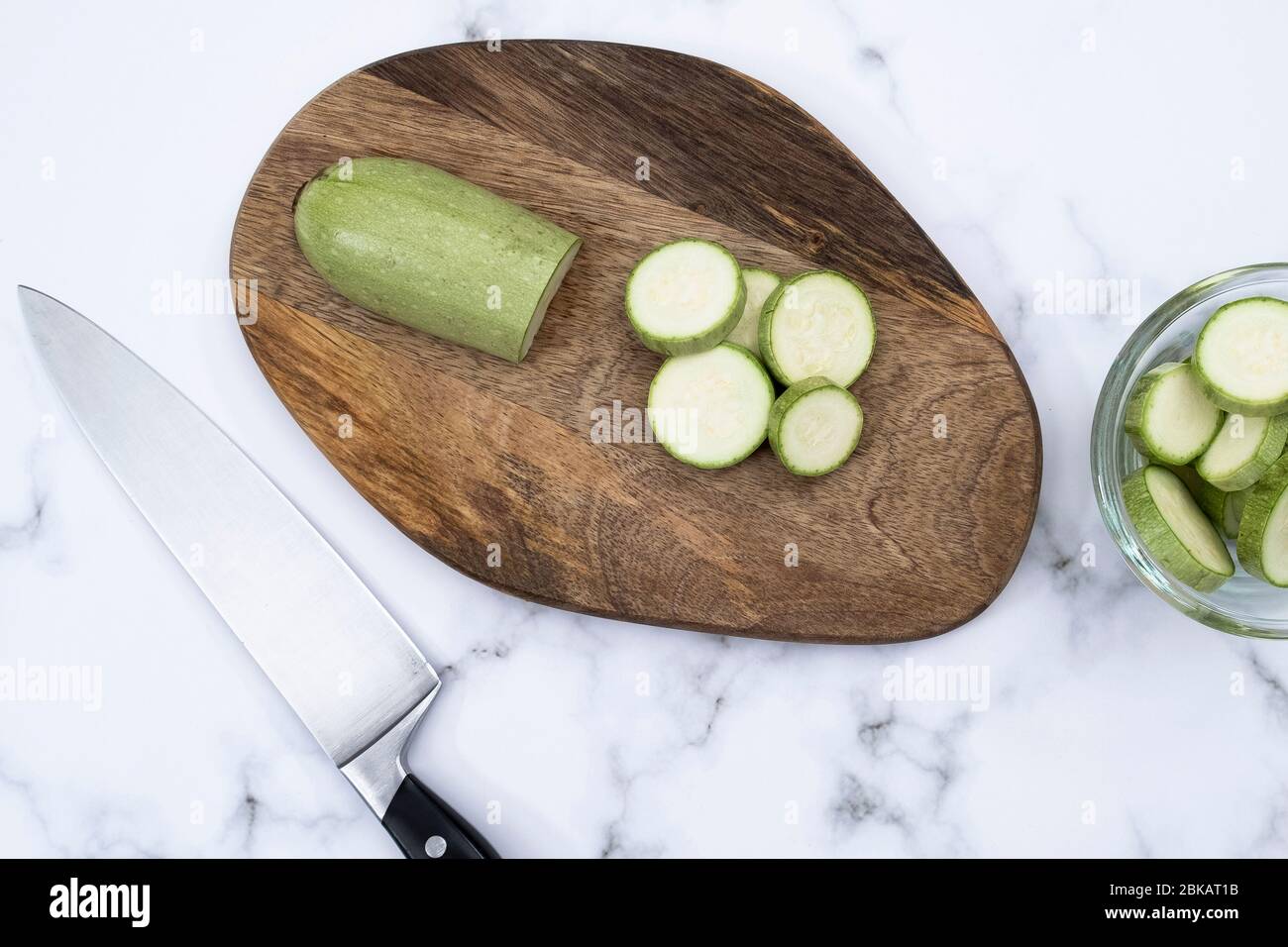 Cut zucchini on chopping board hi-res stock photography and images - Alamy