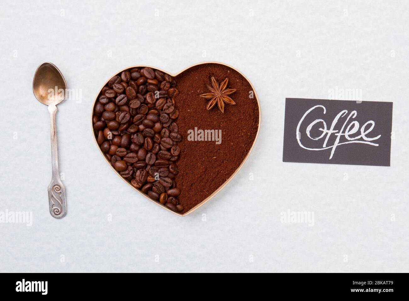 Coffee beans and instant coffee in a shape of heart Stock Photo - Alamy