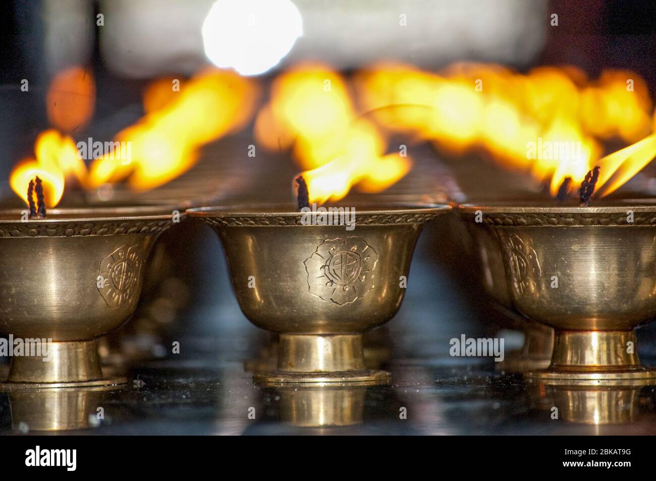 Fire Lamps in a Buddhist temple in Thimphu, Bhutan Stock Photo - Alamy