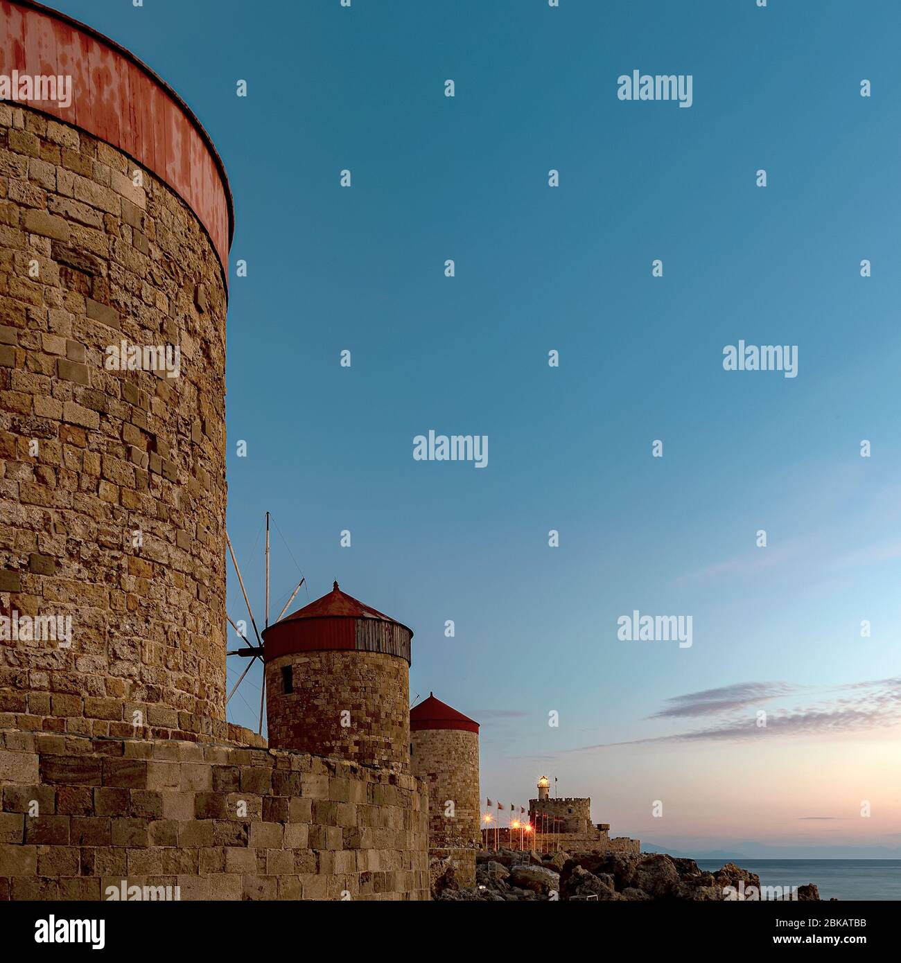 A long exposure photograph of the Fort of St Nicholas and windmills at ...