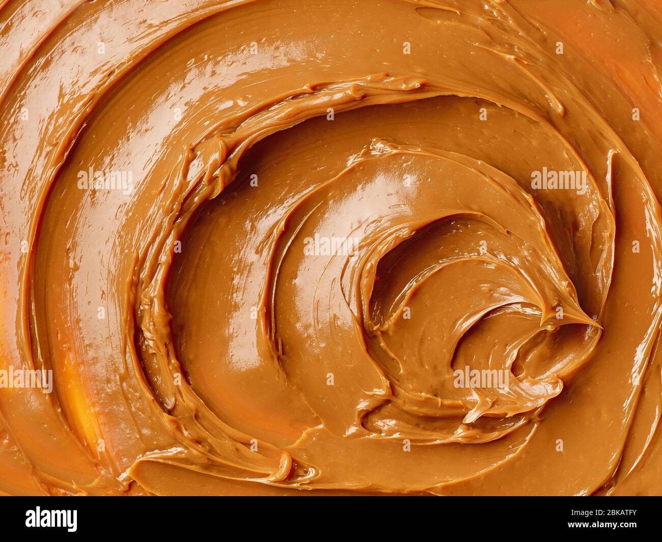 melted caramel background, top view Stock Photo - Alamy