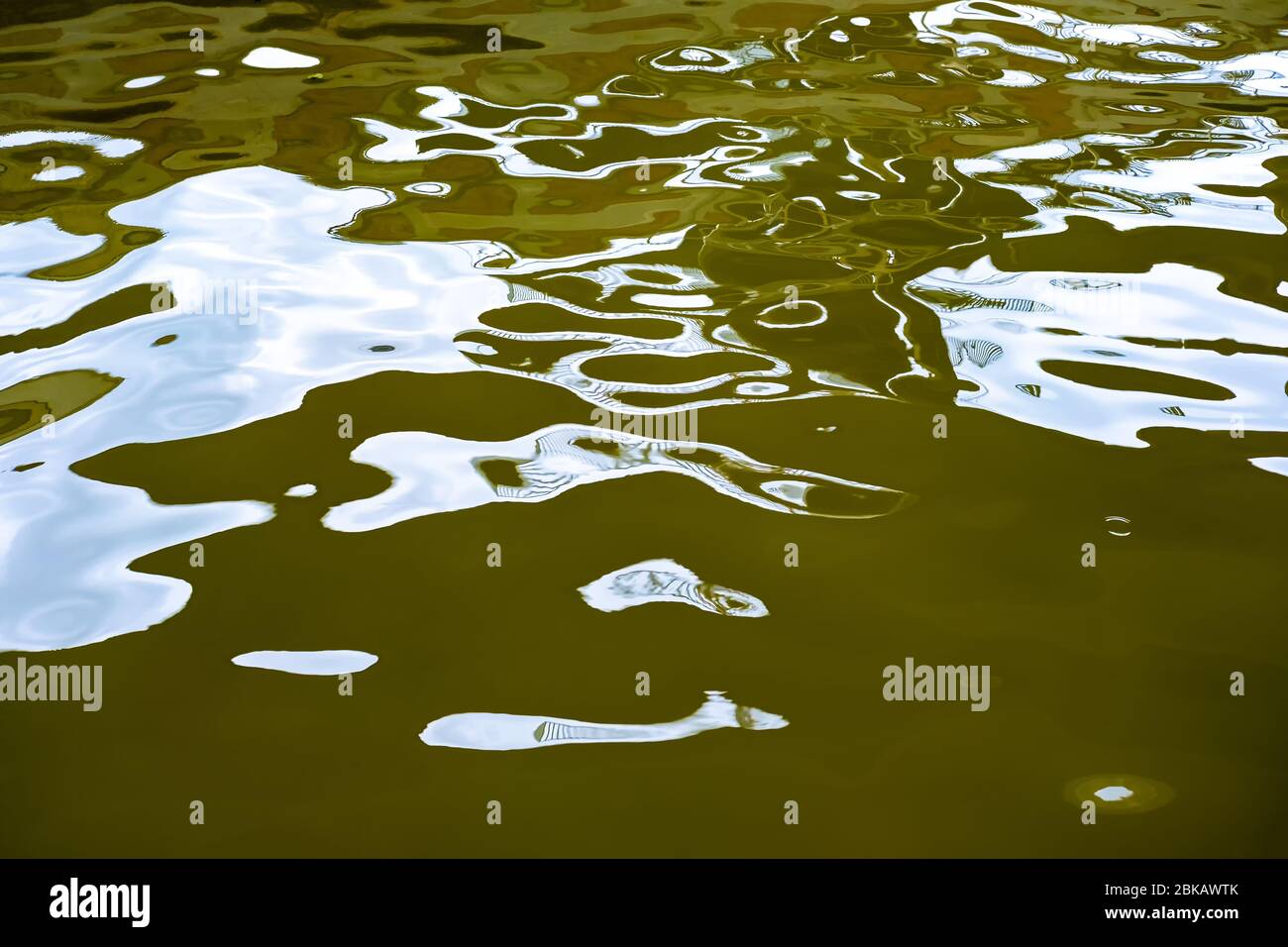 Light reflections of river water waves Stock Photo - Alamy