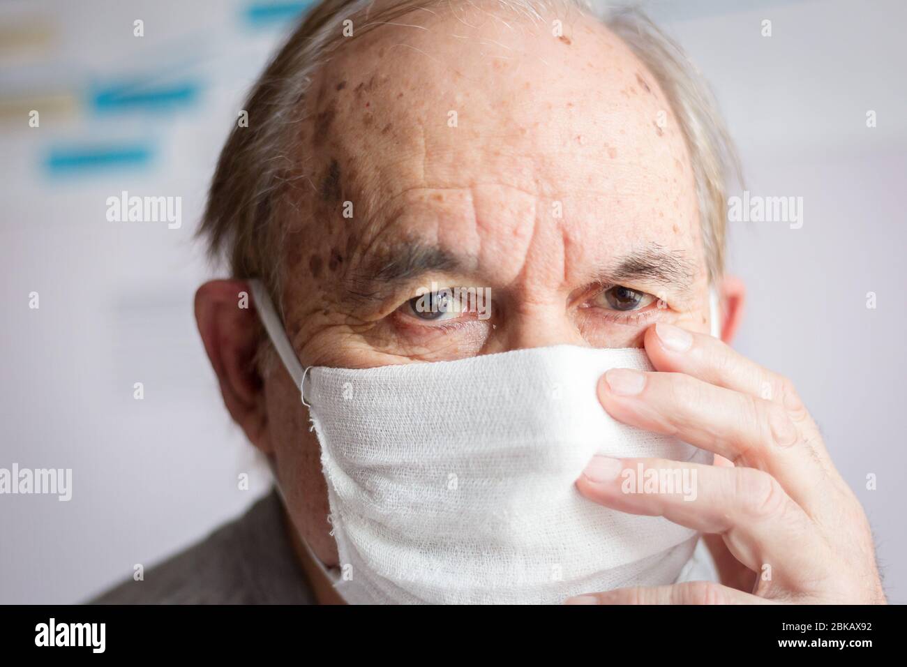 Elderly portrait man at home isolation Stock Photo - Alamy