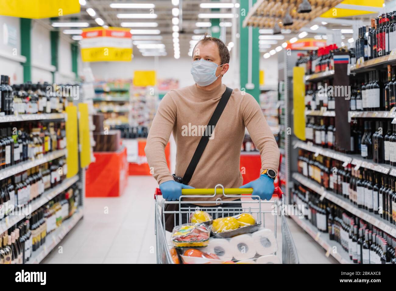 Man running shopping cart in hi-res stock photography and images - Alamy
