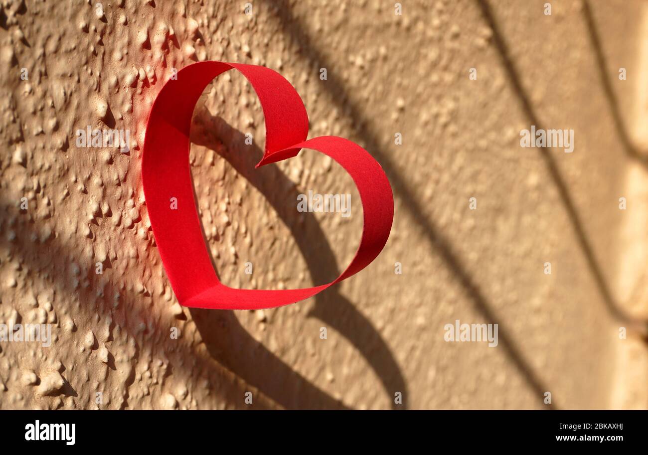 Modern blurred abstract background shadow of heart. Playing with ...