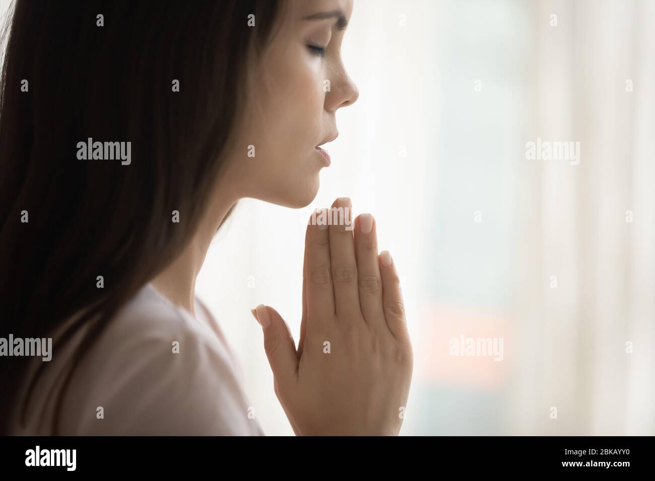 Believer woman hi-res stock photography and images - Alamy
