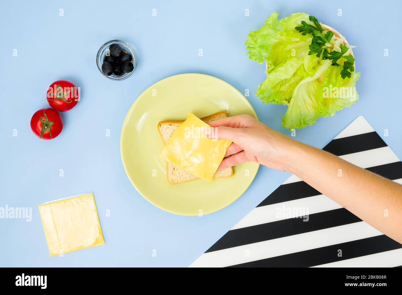 Fun food art for kids. Ladybug sandwich on blue background. How to make ...