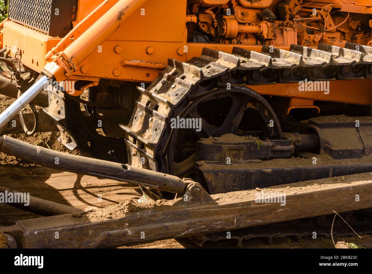 Industrial building construction site bulldozer leveling and moving ...