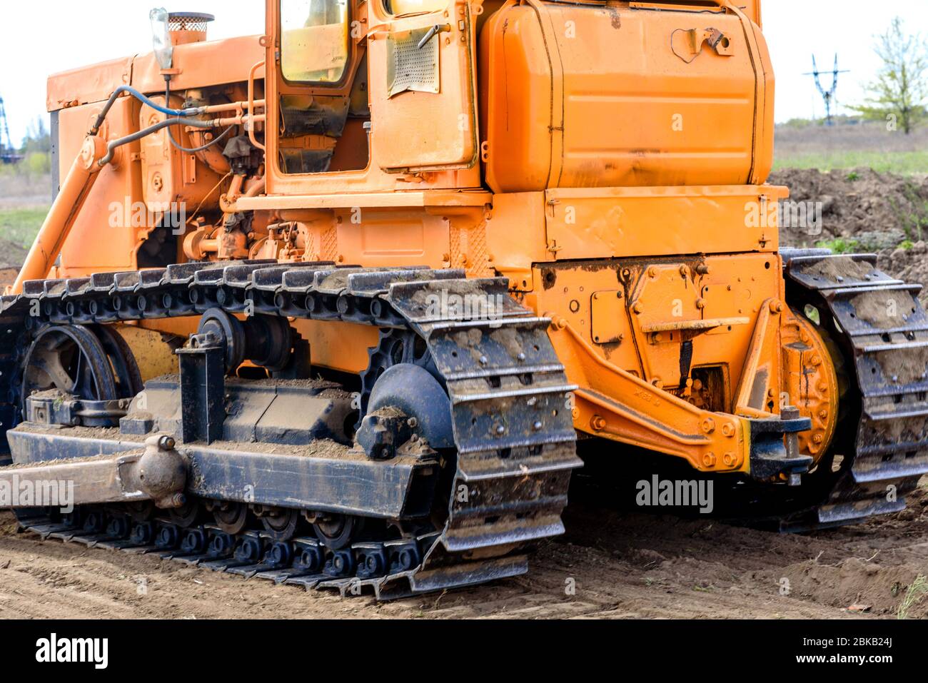 Industrial building construction site bulldozer leveling and moving ...