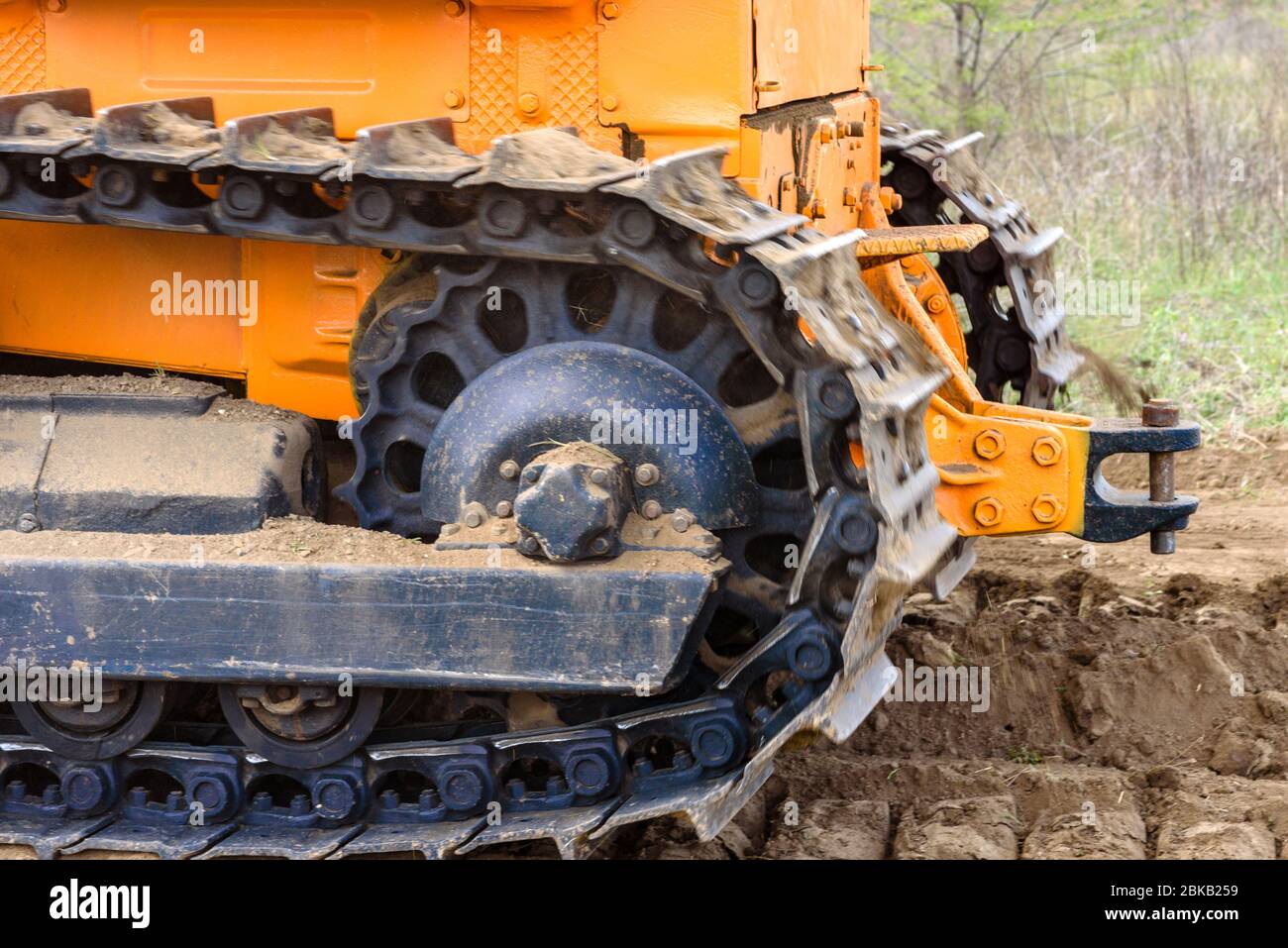 Industrial building construction site bulldozer leveling and moving ...