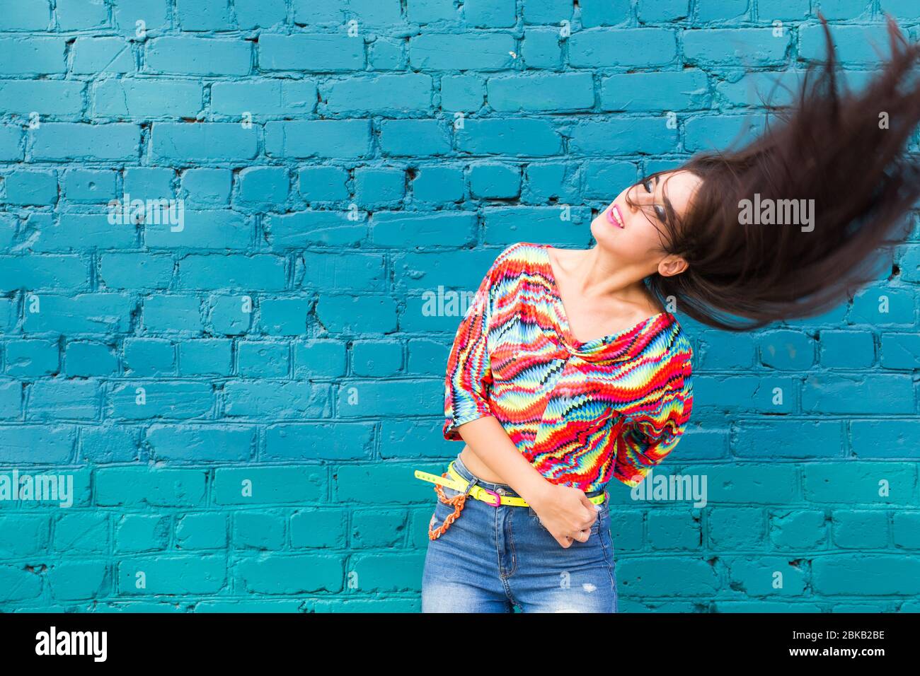 Street shaabi dance and urban dancer concept - Cheerful belly dancer ...