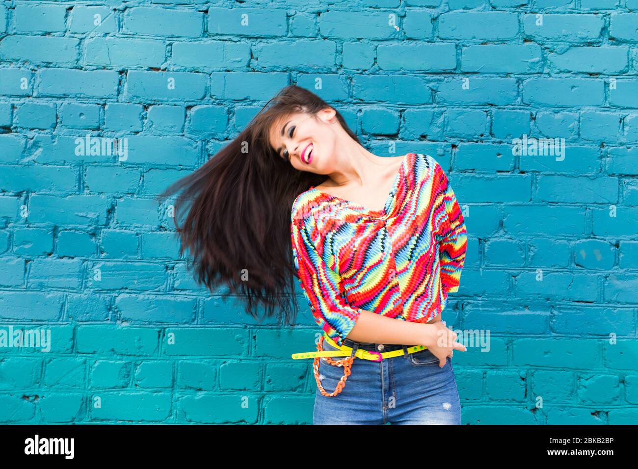 Street shaabi dance and urban dancer concept - Cheerful belly dancer ...