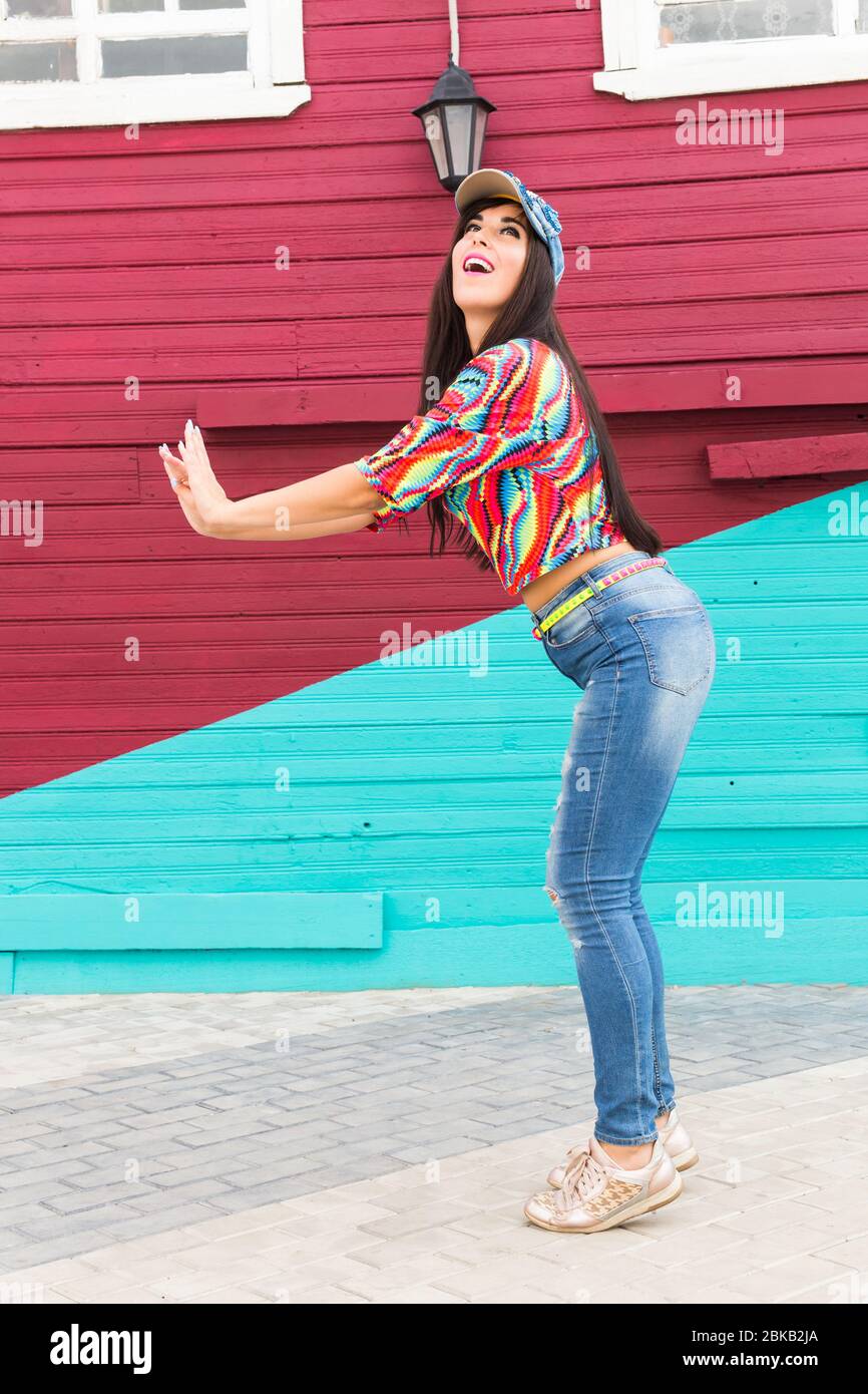 Street shaabi dance and urban dancer concept - Cheerful belly dancer ...