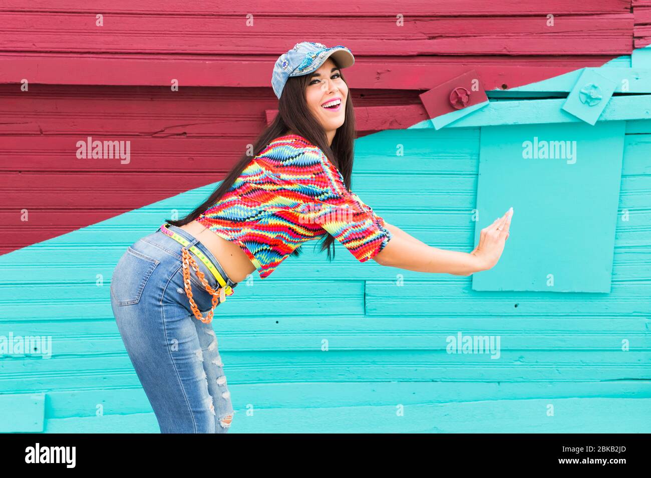 Street shaabi dance and urban dancer concept - Cheerful belly dancer ...