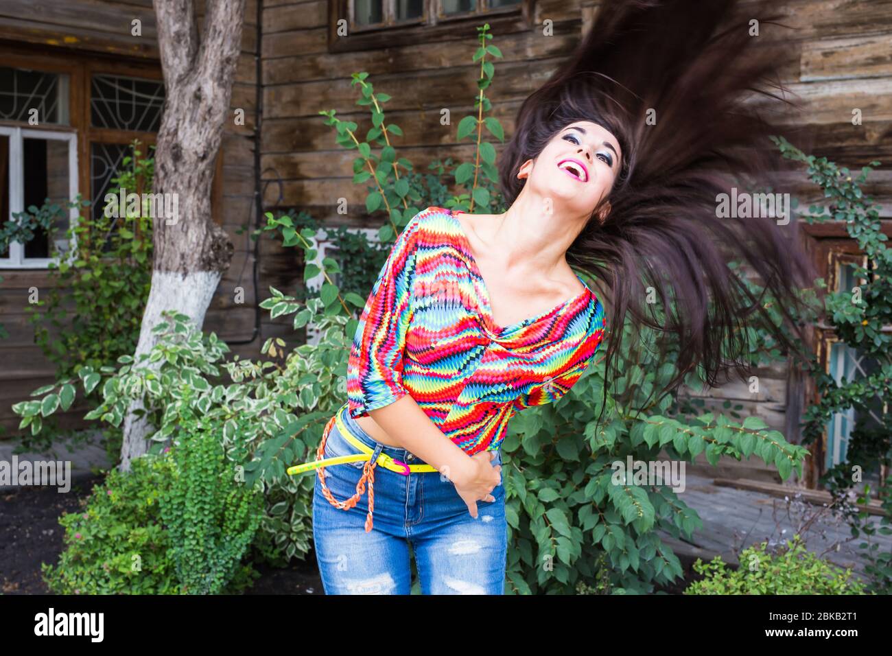 Street shaabi dance and urban dancer concept - Cheerful belly dancer ...