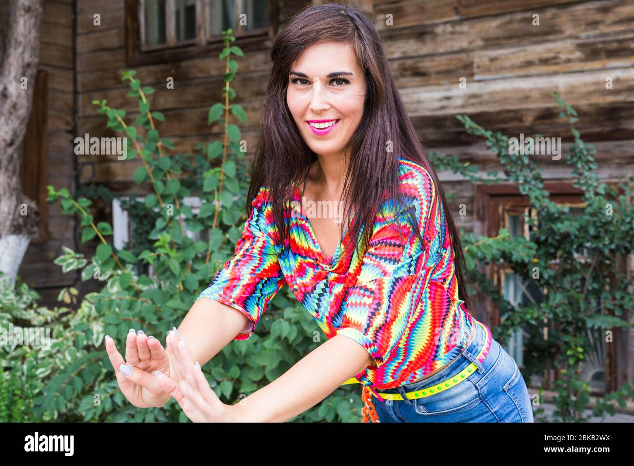 Street shaabi dance and urban dancer concept - Cheerful belly dancer ...