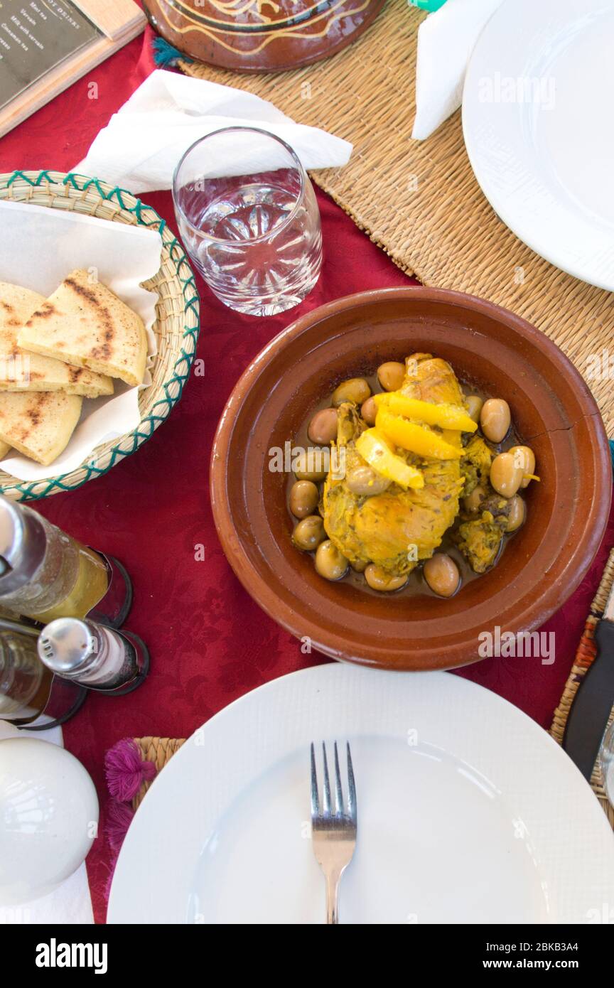 Traditional Chicken tajine on table top down view Stock Photo - Alamy