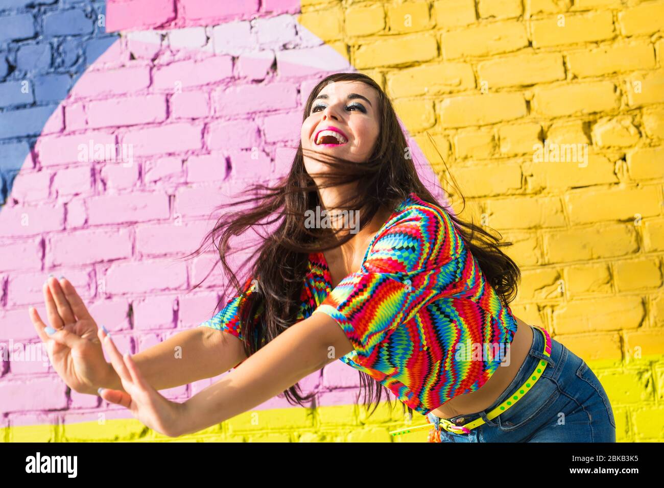 Street shaabi dance and urban dancer concept - Cheerful belly dancer ...