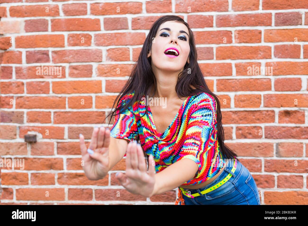 Street shaabi dance and urban dancer concept - Cheerful belly dancer ...