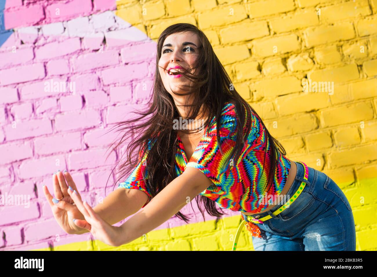 Street shaabi dance and urban dancer concept - Cheerful belly dancer ...