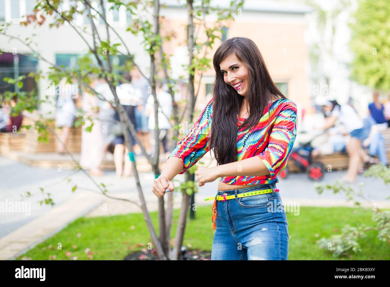 Street shaabi dance and urban dancer concept - Cheerful belly dancer ...