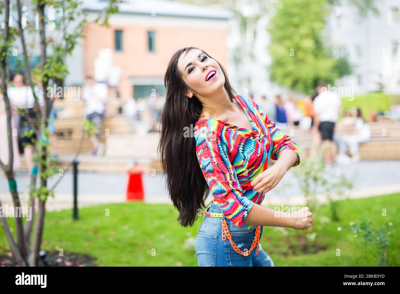 Street shaabi dance and urban dancer concept - Cheerful belly dancer ...