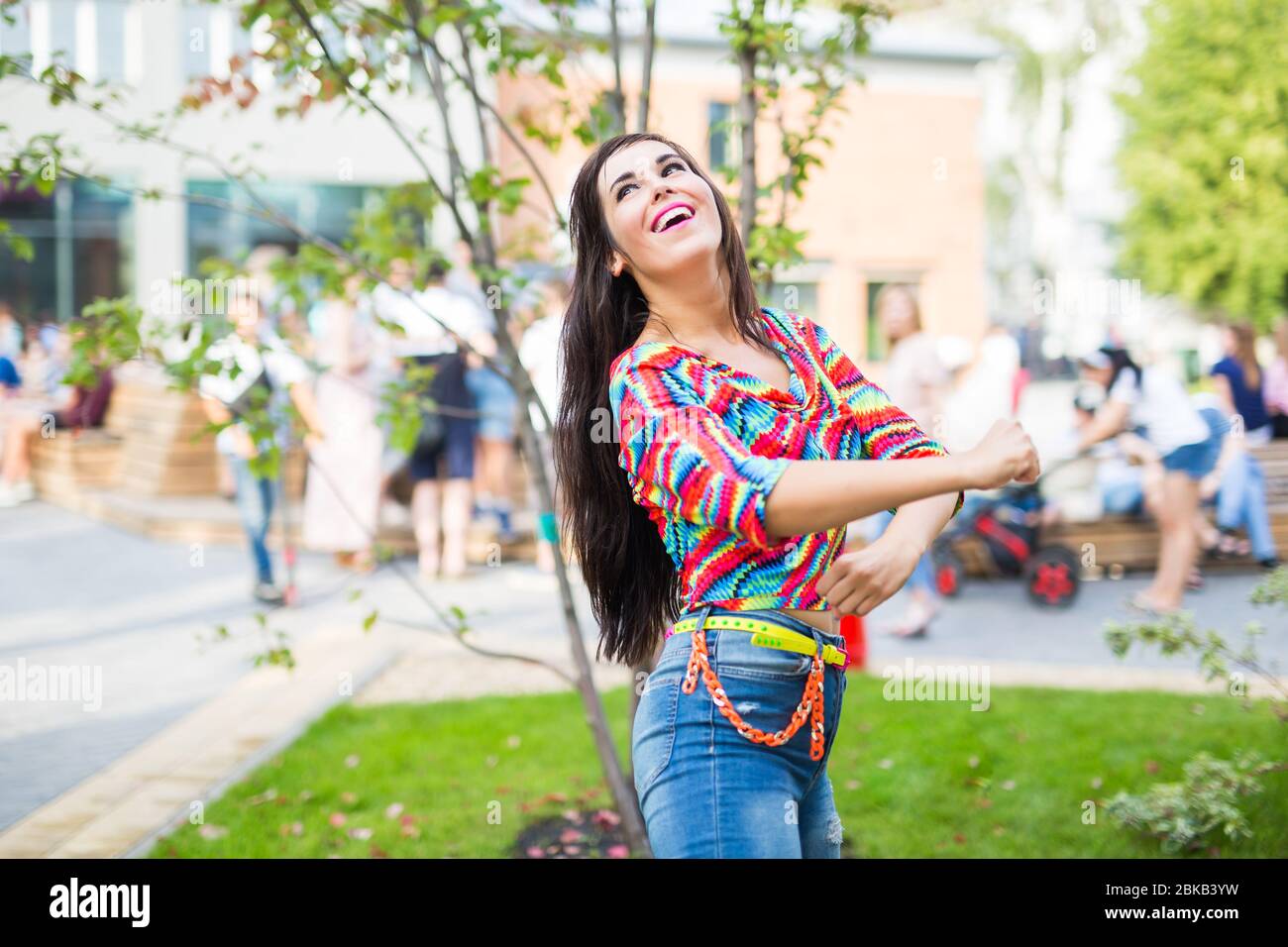 Street shaabi dance and urban dancer concept - Cheerful belly dancer ...
