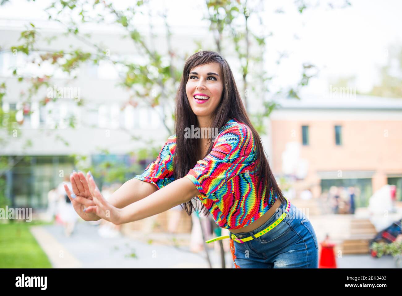 Street shaabi dance and urban dancer concept - Cheerful belly dancer ...