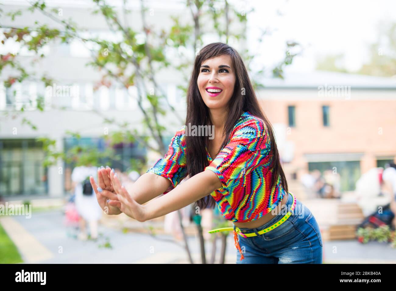 Street shaabi dance and urban dancer concept - Cheerful belly dancer ...