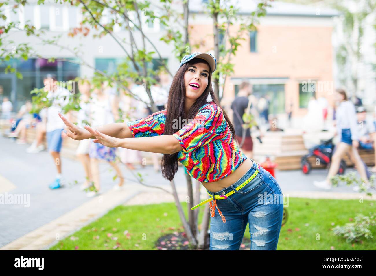 Street shaabi dance and urban dancer concept - Cheerful belly dancer ...