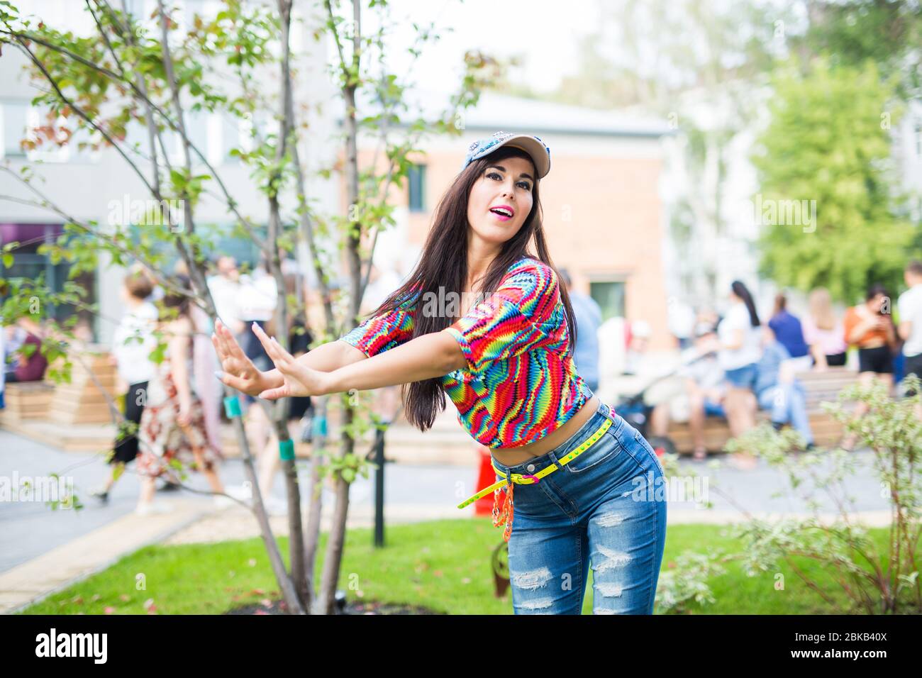 Street shaabi dance and urban dancer concept - Cheerful belly dancer ...