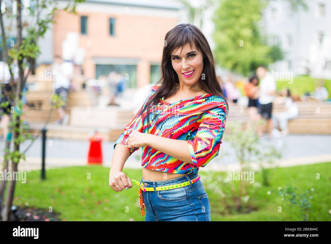 Street shaabi dance and urban dancer concept - Cheerful belly dancer ...