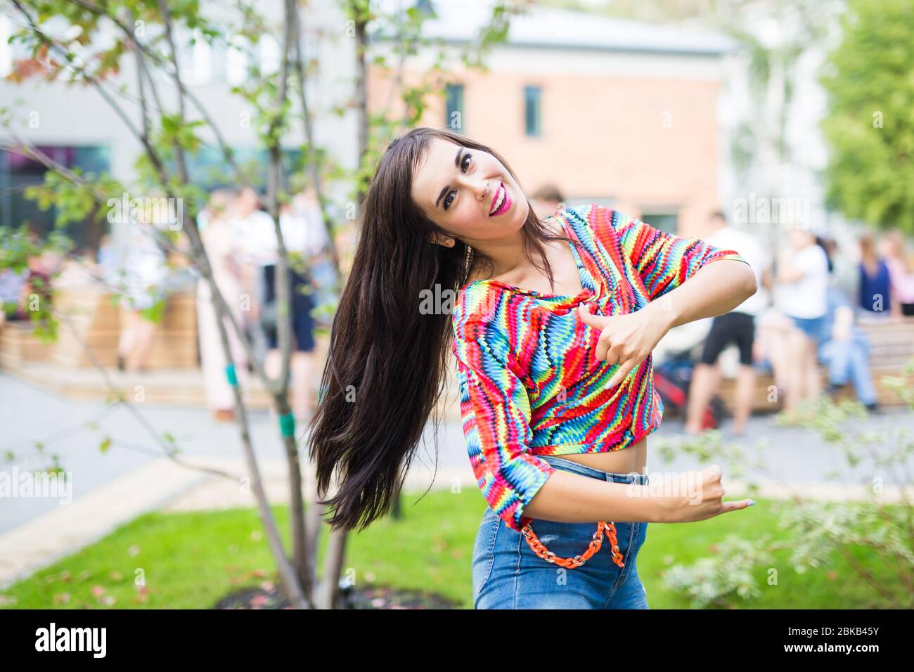 Street shaabi dance and urban dancer concept - Cheerful belly dancer ...