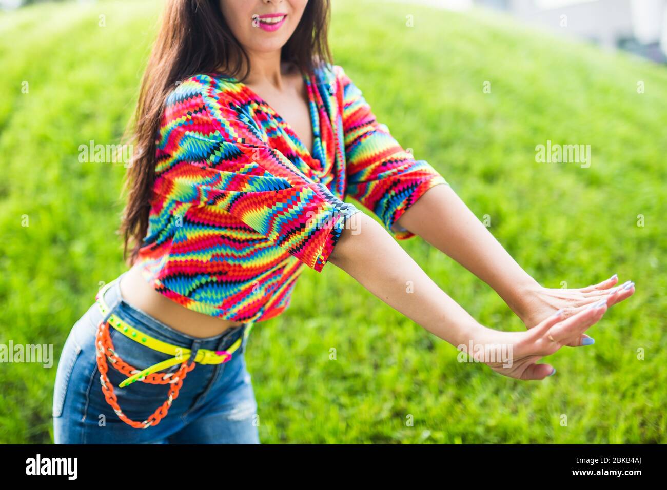 Street shaabi dance and urban dancer concept - Cheerful belly dancer ...