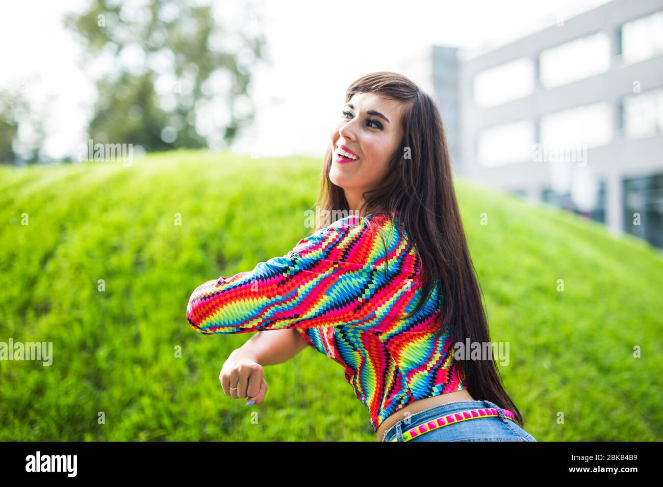 Street shaabi dance and urban dancer concept - Cheerful belly dancer ...