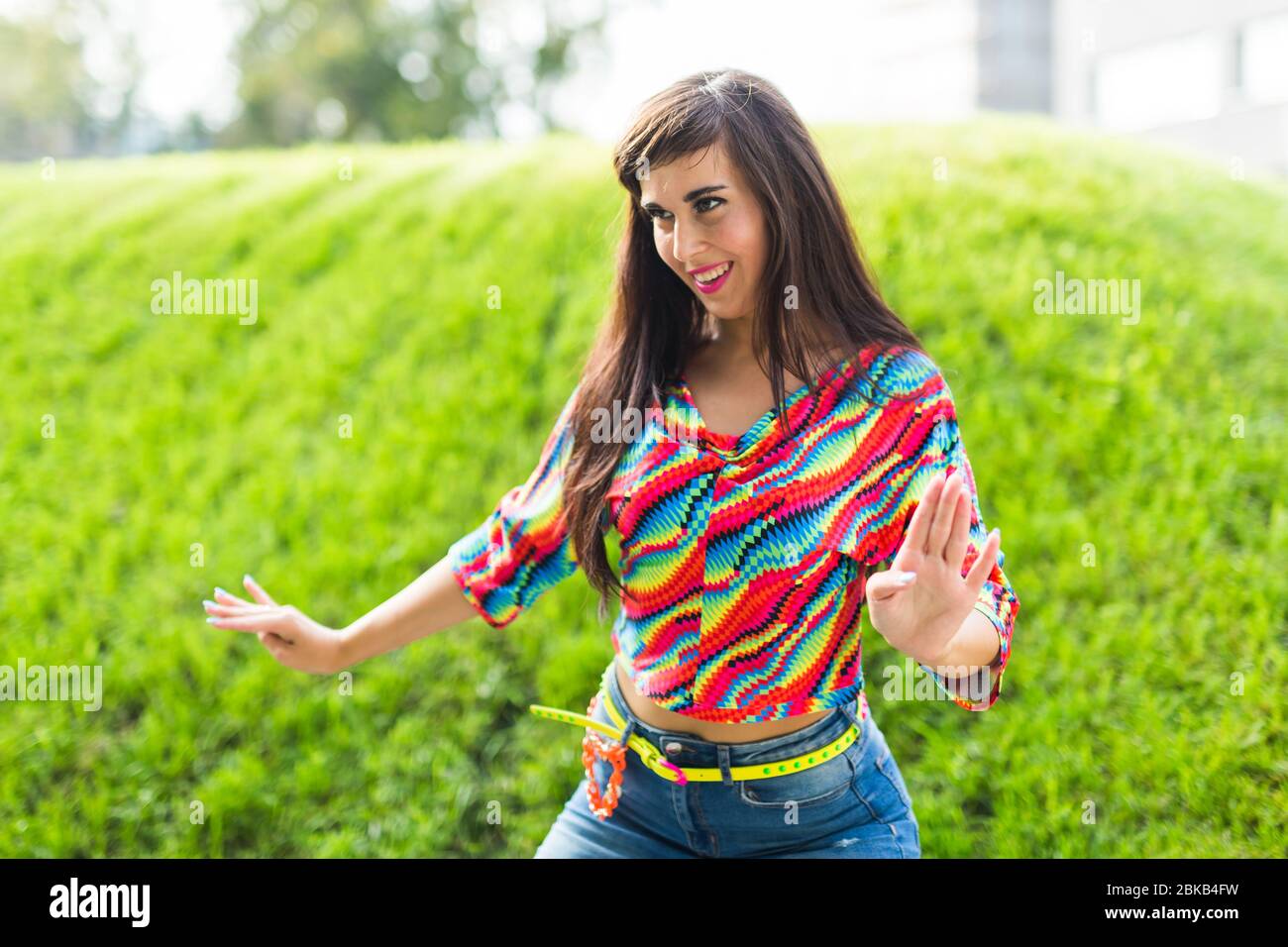 Street shaabi dance and urban dancer concept - Cheerful belly dancer ...